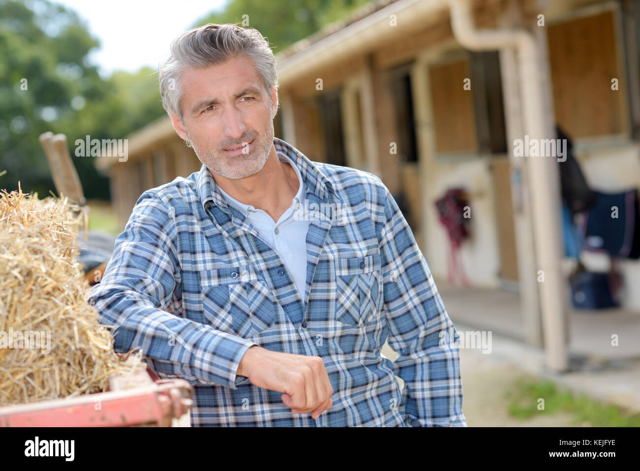 farmer resting from work Stock Photo - Alamy