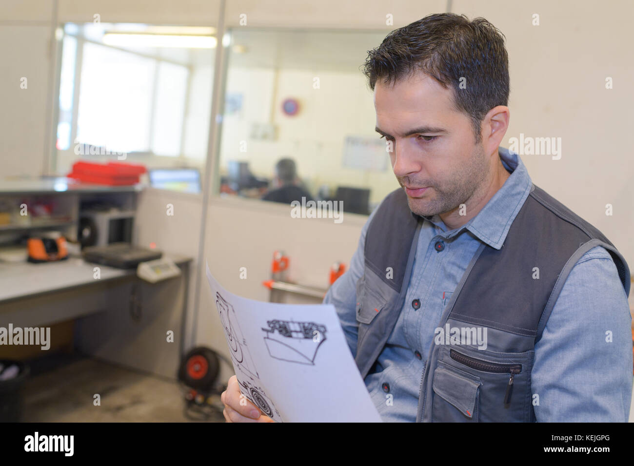 reading the instruction manual Stock Photo - Alamy