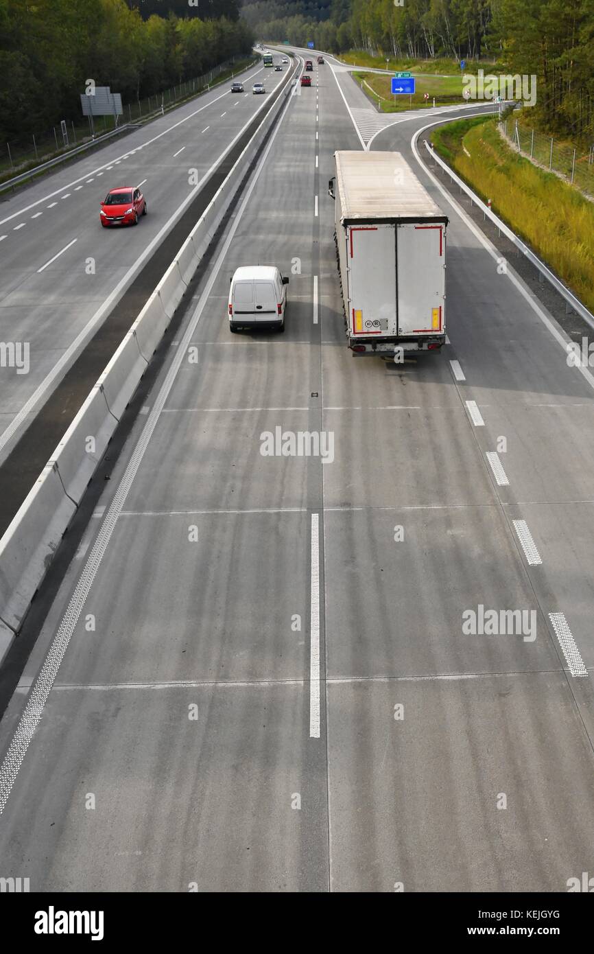 Cars on highway in traffic jam Stock Photo - Alamy