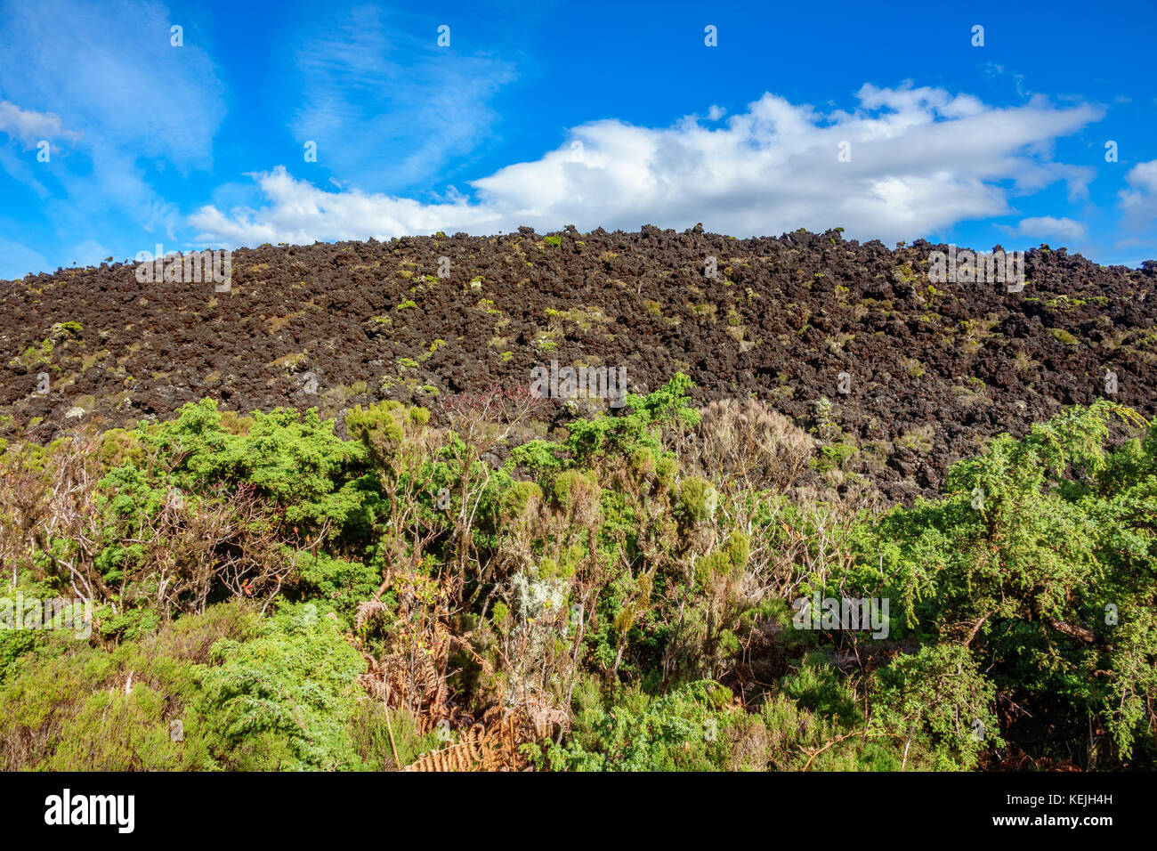 Volcanic rocks hill Stock Photo - Alamy