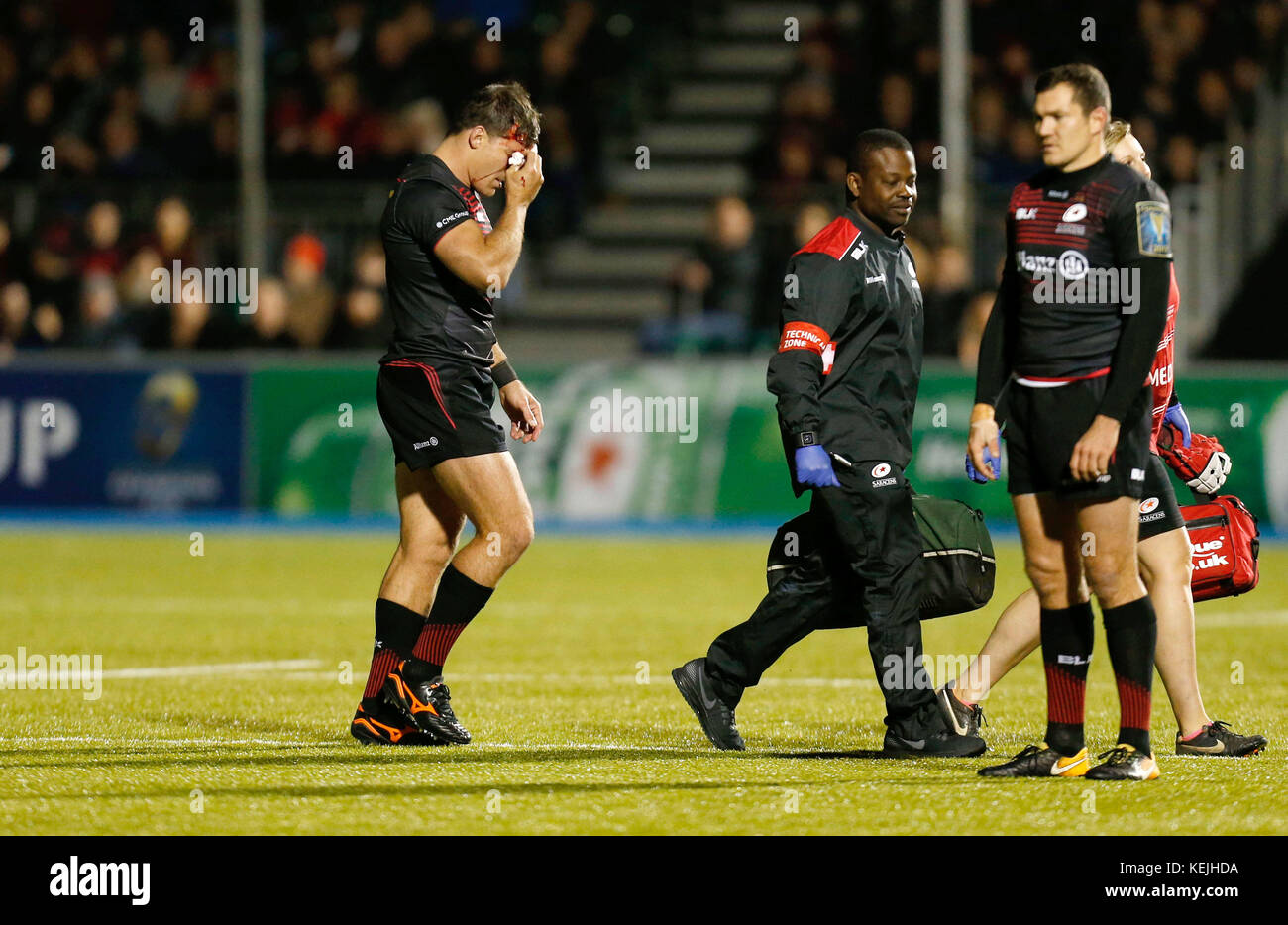 Saracens' Schlak Brits goes off with a head injury during the Champions ...