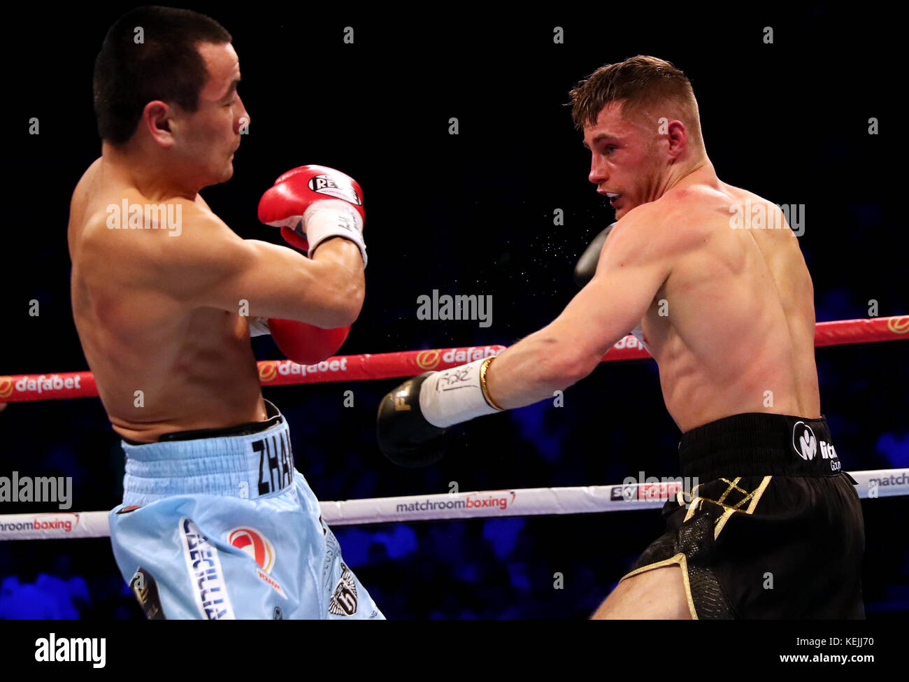 Ryan Burnett (right) in action against Zhanat Zhakiyanov in action ...