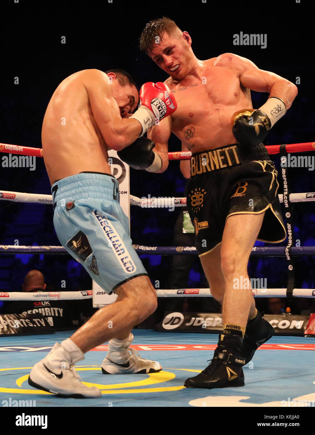 Ryan Burnett (right) in action against Zhanat Zhakiyanov in action ...