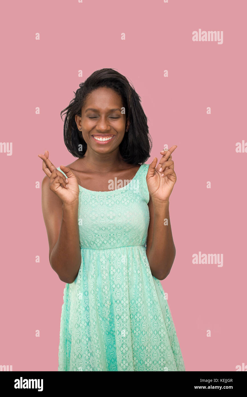 Woman making a wish Stock Photo - Alamy