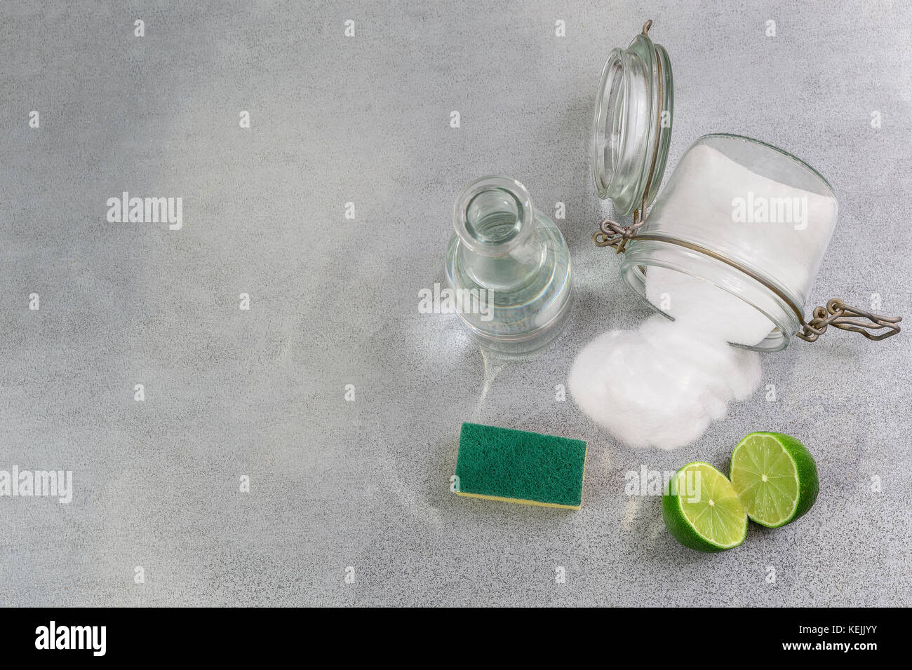 Baking soda, lemon with sponge and objects for effective and safe house ...