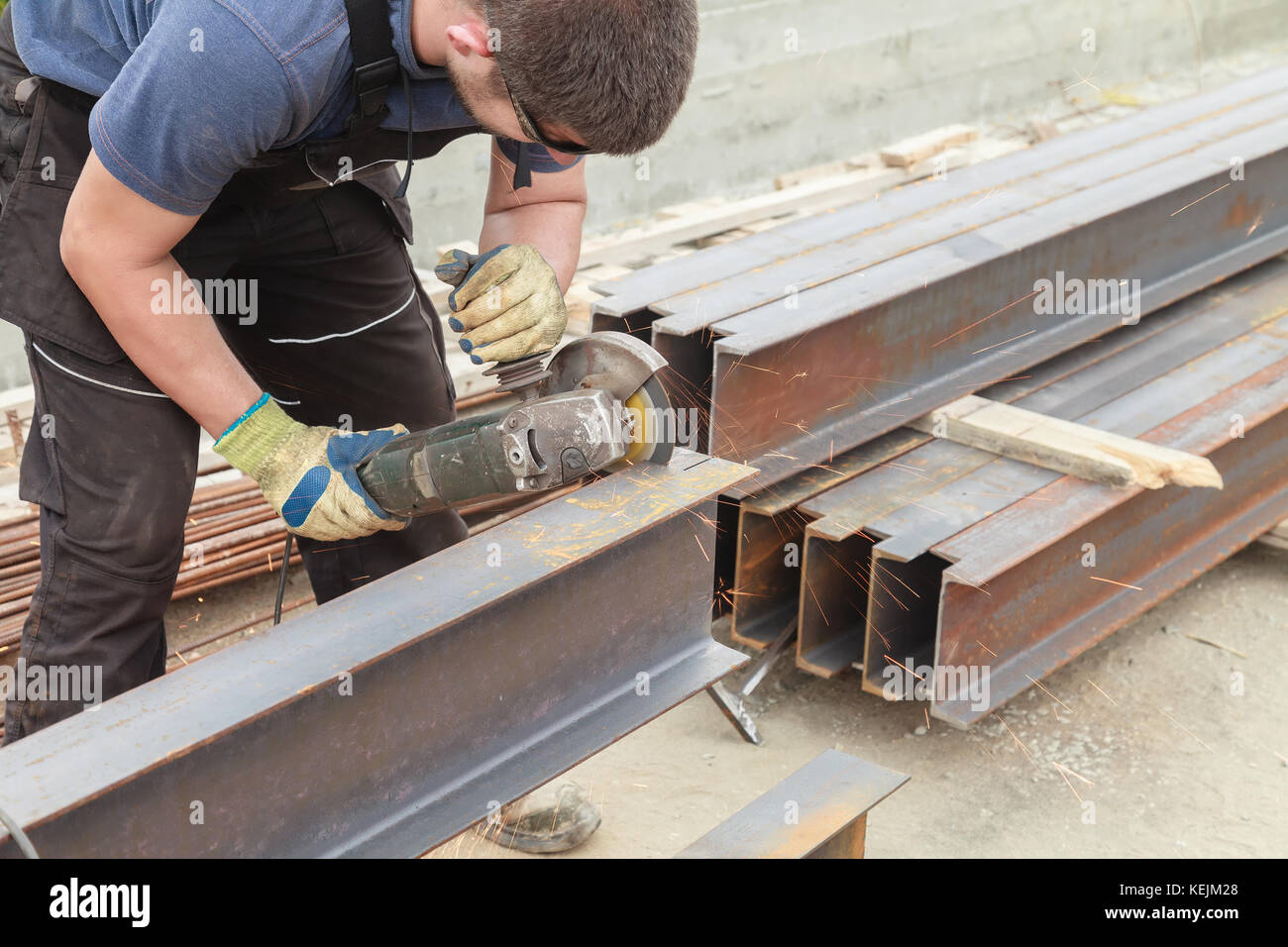 Cutting steel heavy industry by electric flex Stock Photo - Alamy