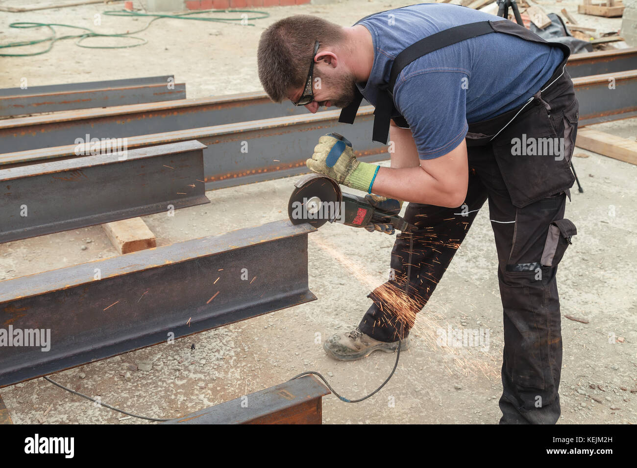 Cutting steel heavy industry by electric flex Stock Photo - Alamy