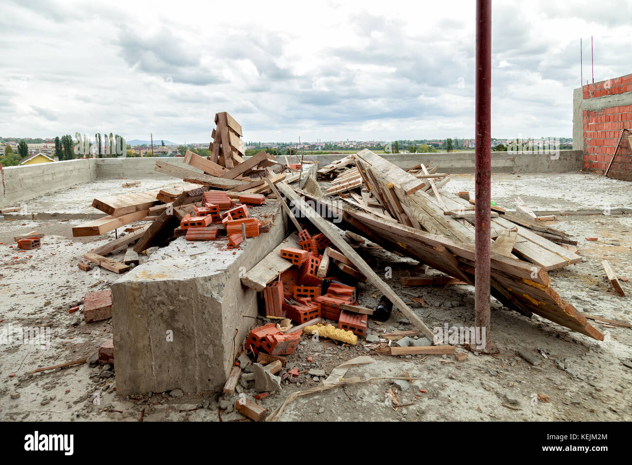 Construction waste on the roof of the house under construction ...