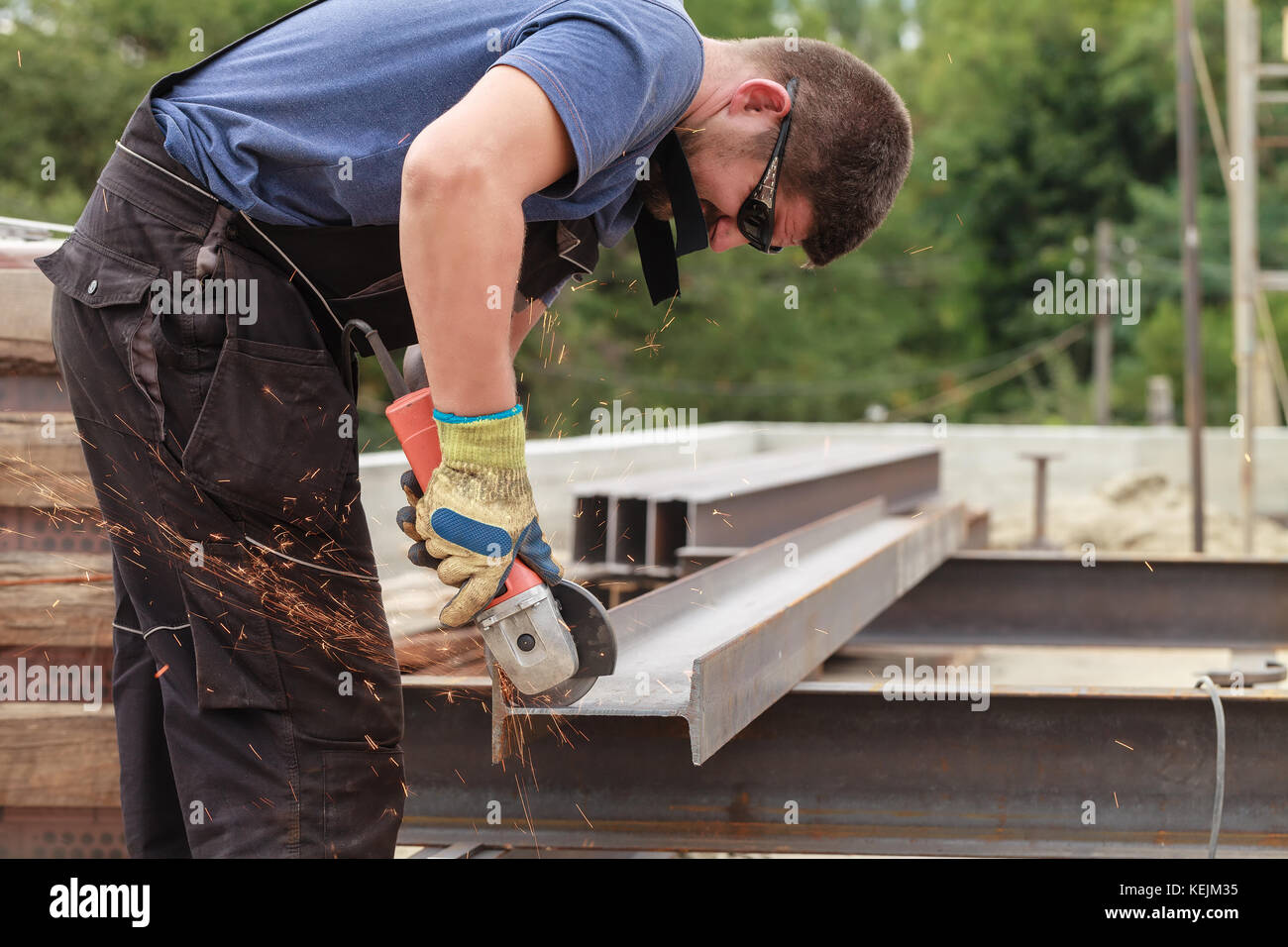 Cutting steel heavy industry by electric flex Stock Photo - Alamy