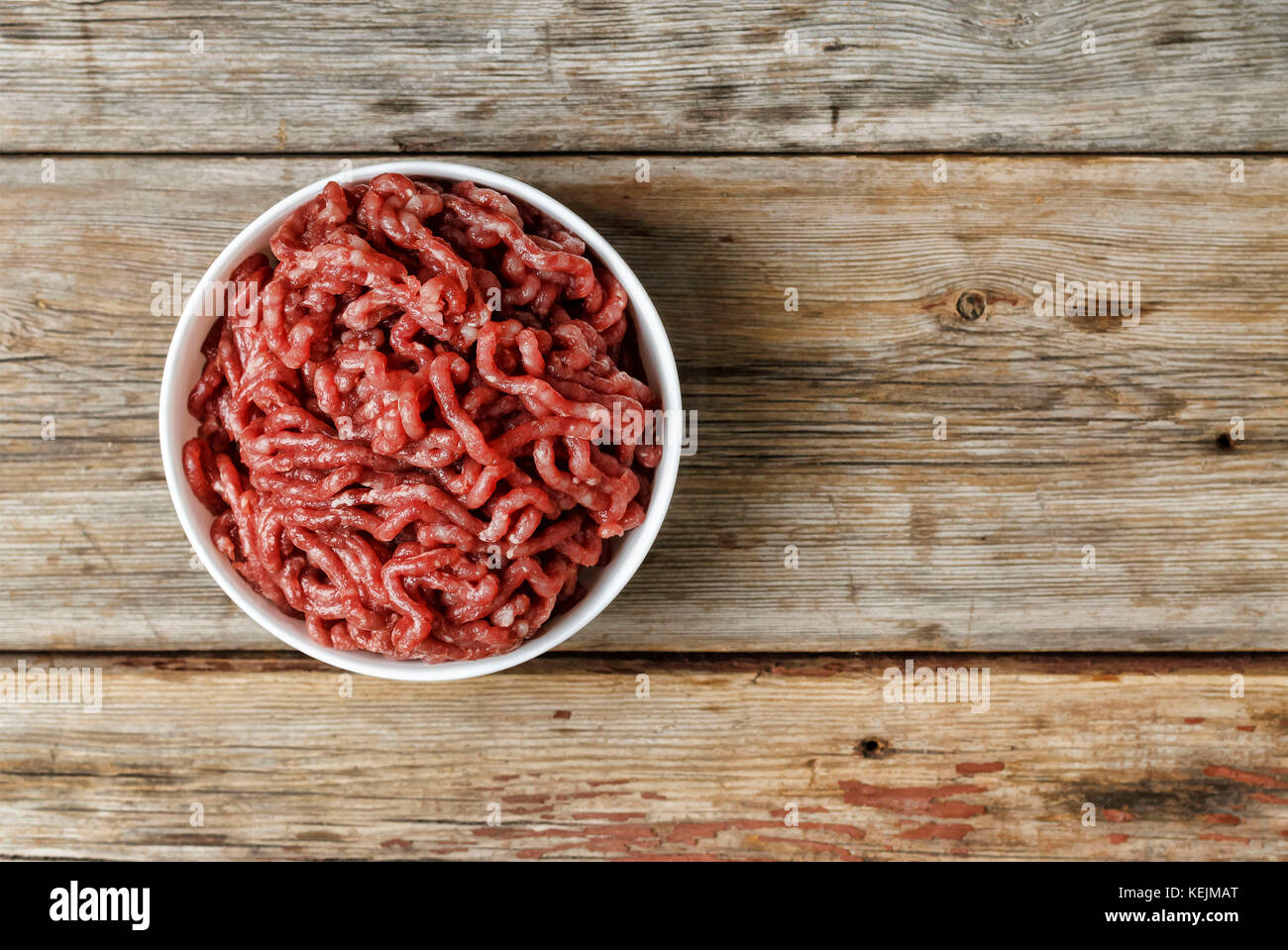Chopped meat on the wooden background. semifinished Stock Photo - Alamy