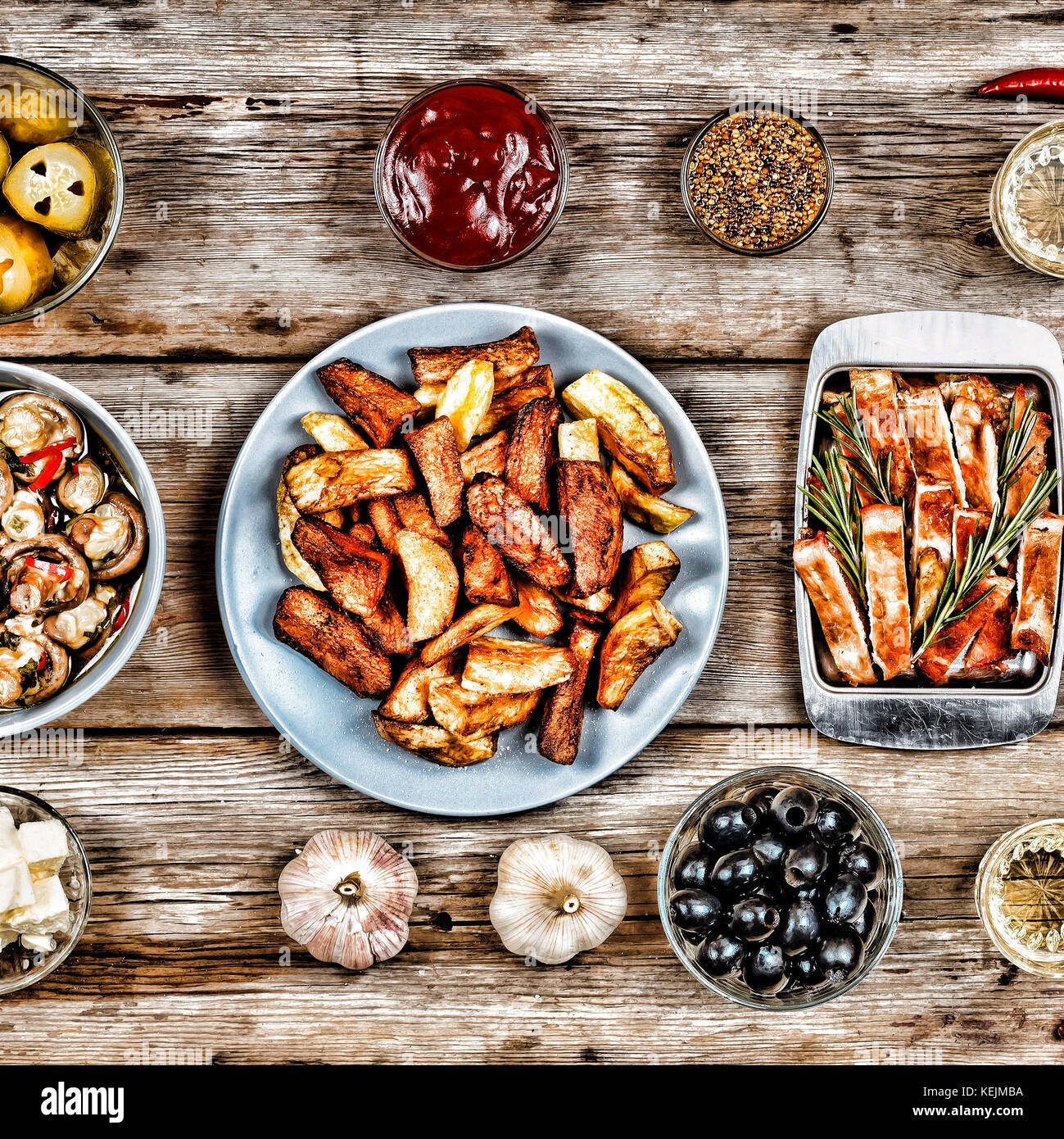 Food set. Traditional American snacks: fried potatoes, pickles, ketchup ...