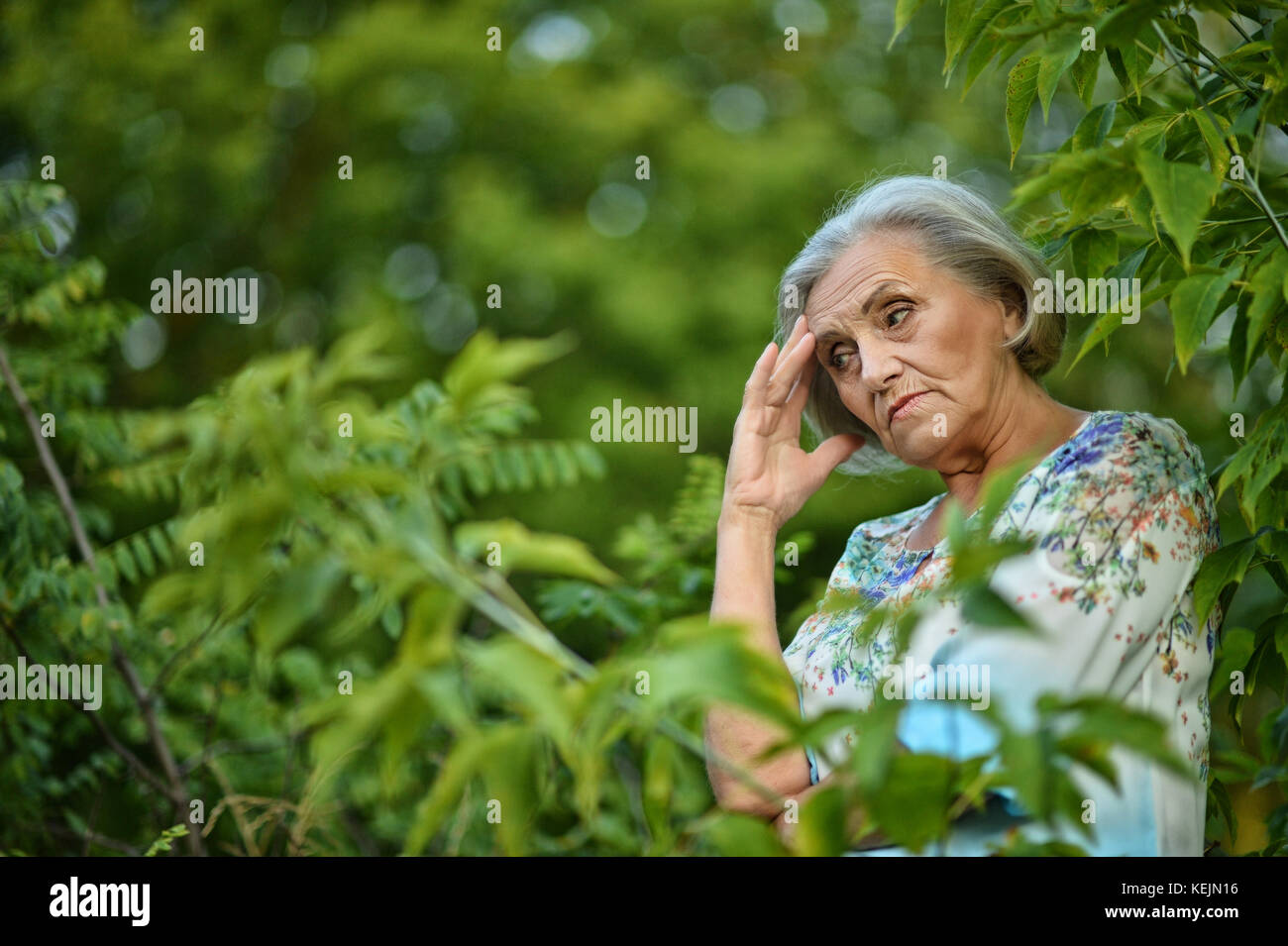 senior beautiful sad woman Stock Photo - Alamy