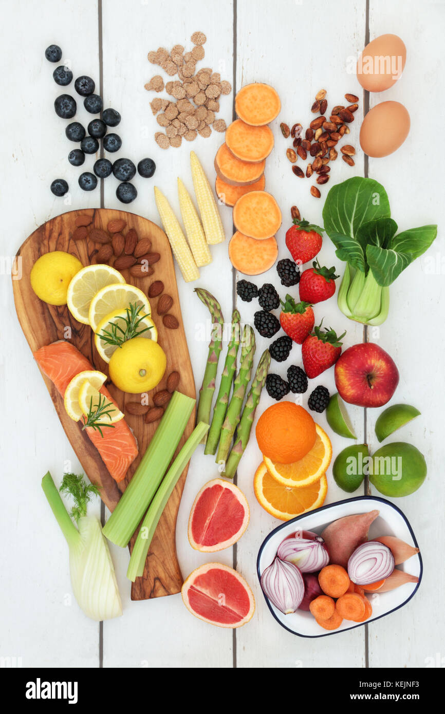 Health food for dieting concept with fresh salmon, fruit, vegetables ...