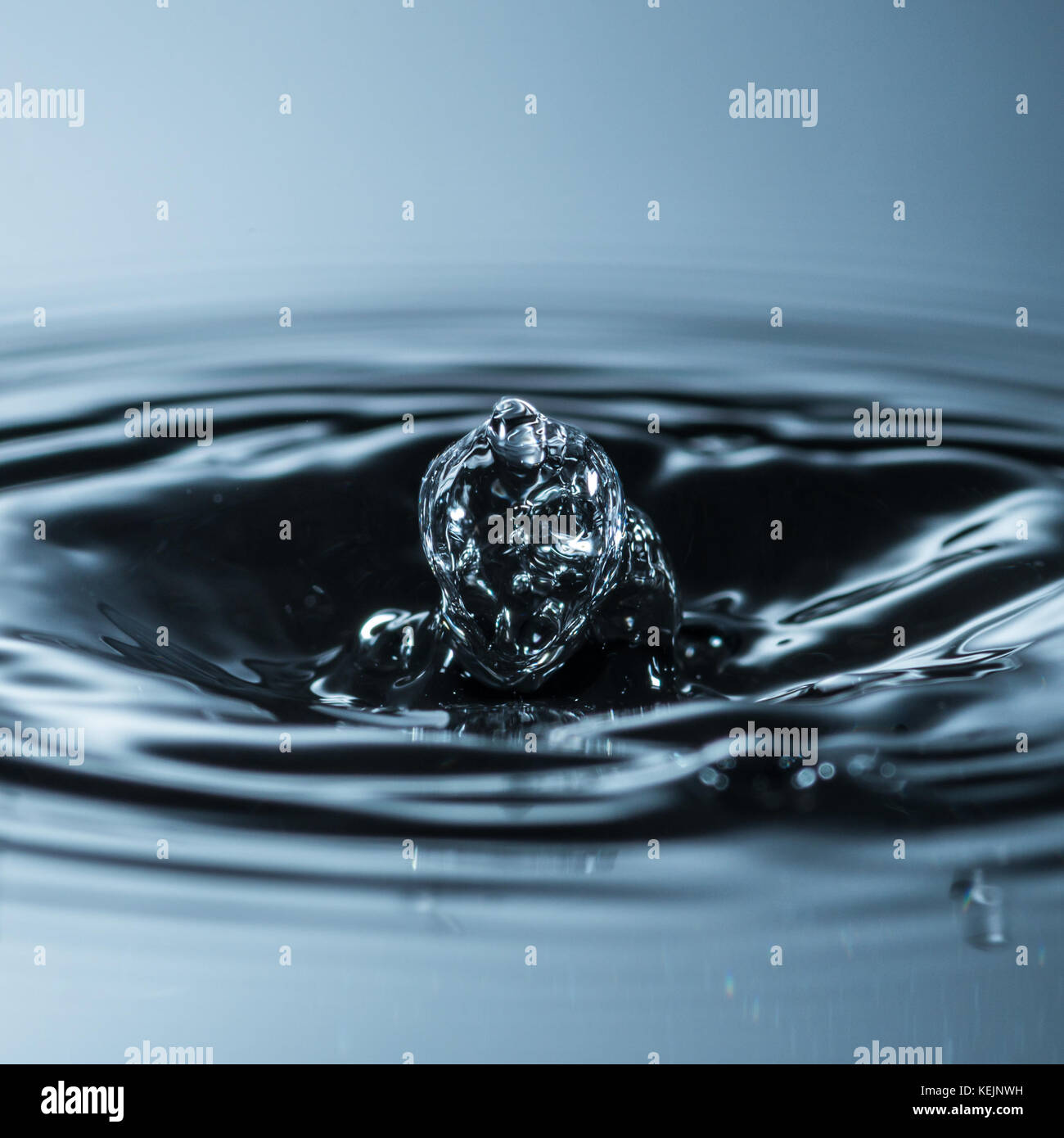 An abstract shot of water dropping into a pool Stock Photo - Alamy