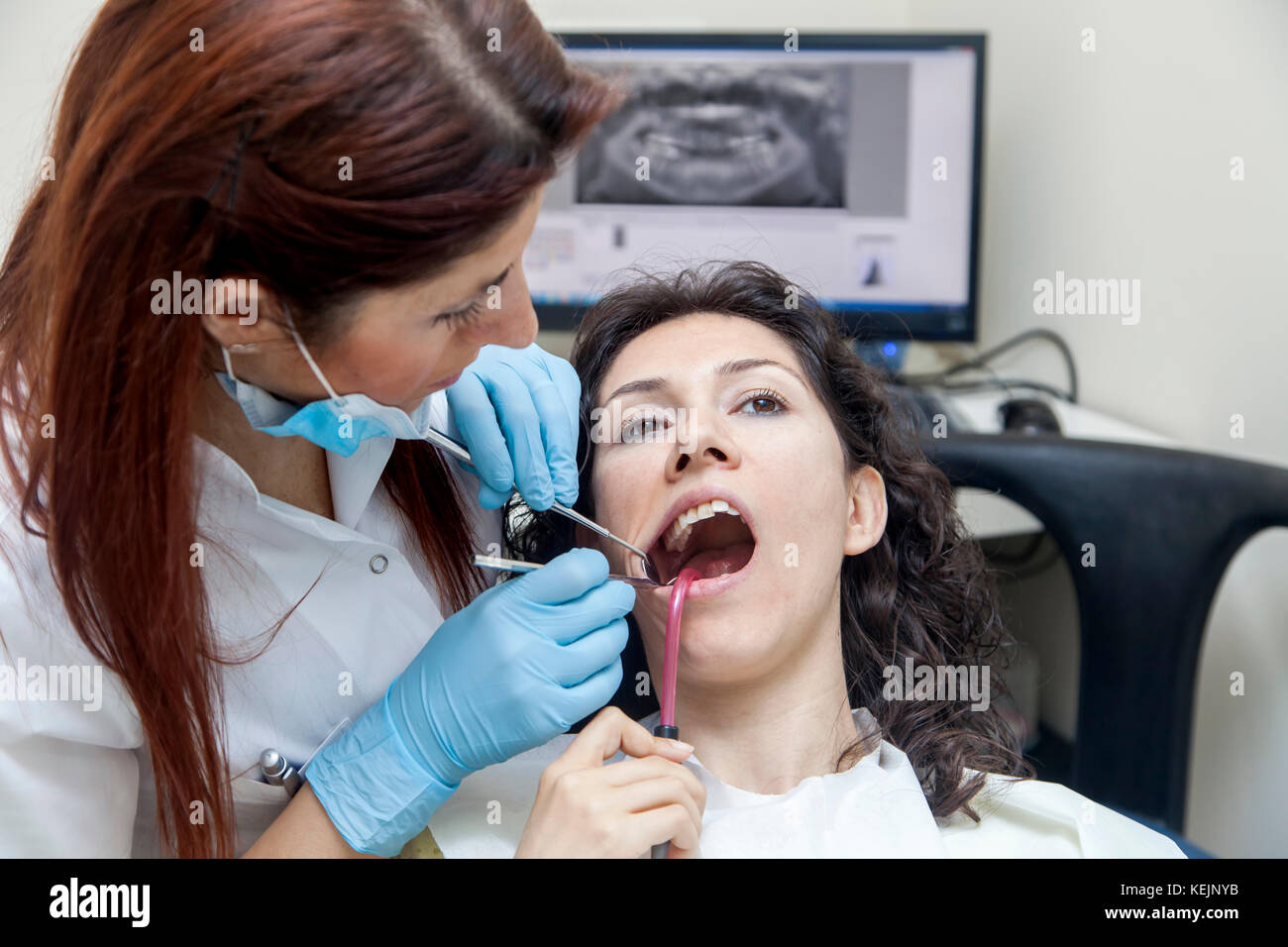 Female patient having teeth hi-res stock photography and images - Alamy