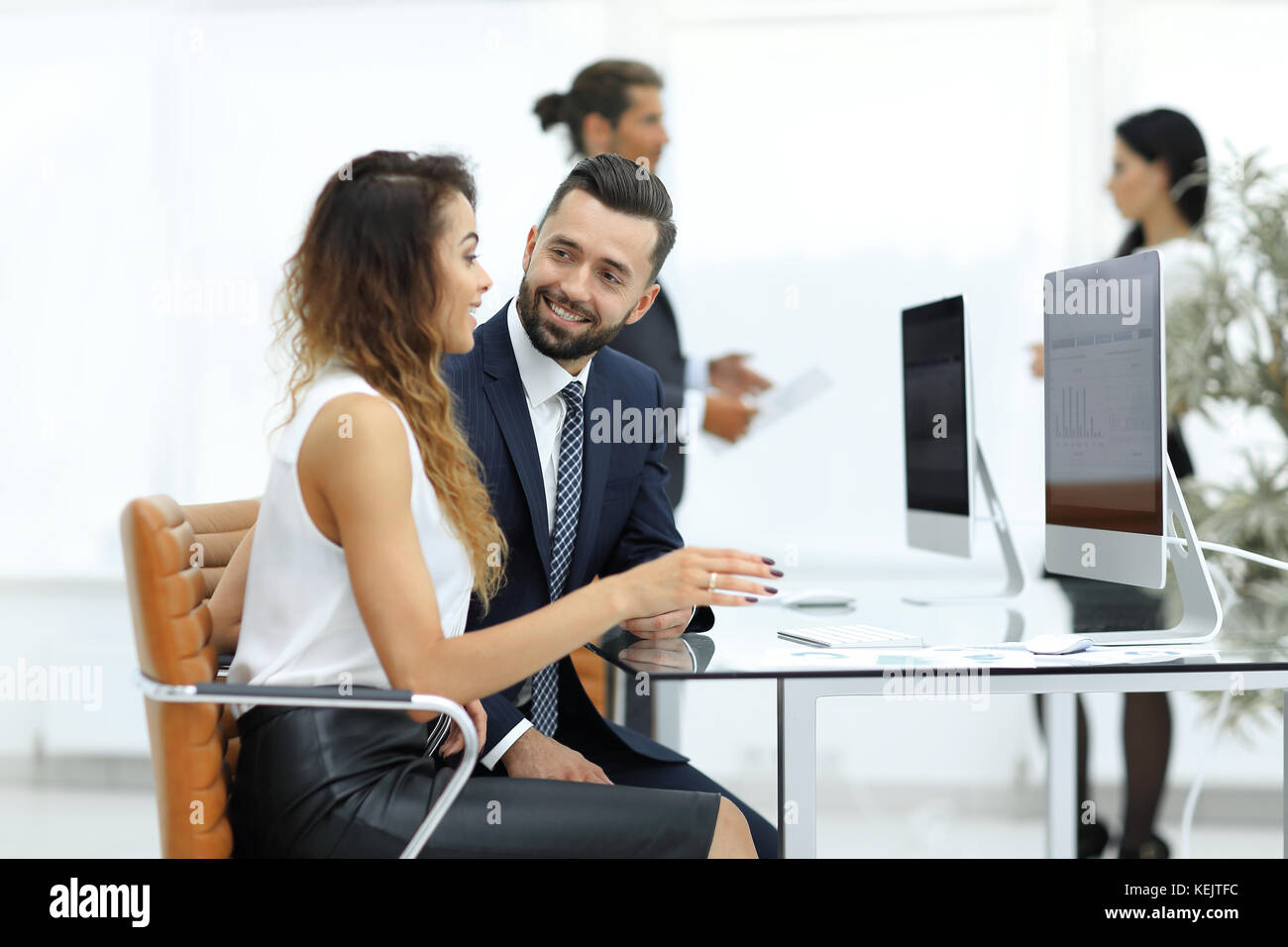 colleagues talking, sitting at your Desk Stock Photo - Alamy