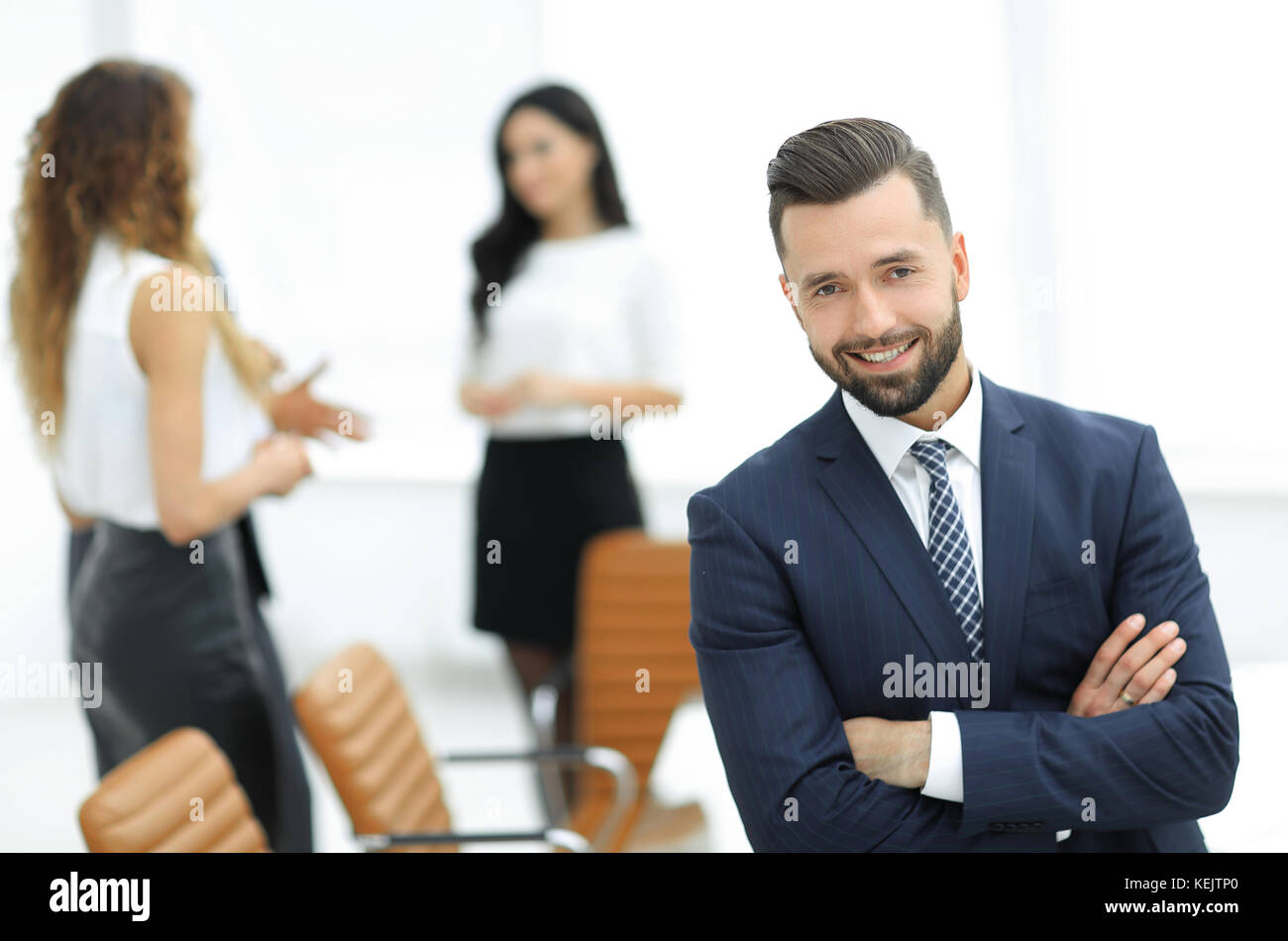 businessman on background of office Stock Photo - Alamy