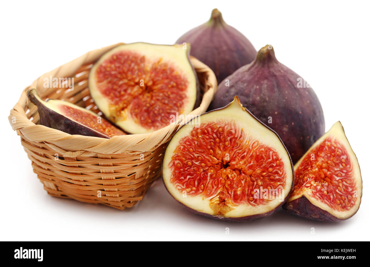 Fresh organic common fig whole and sliced on white Stock Photo - Alamy