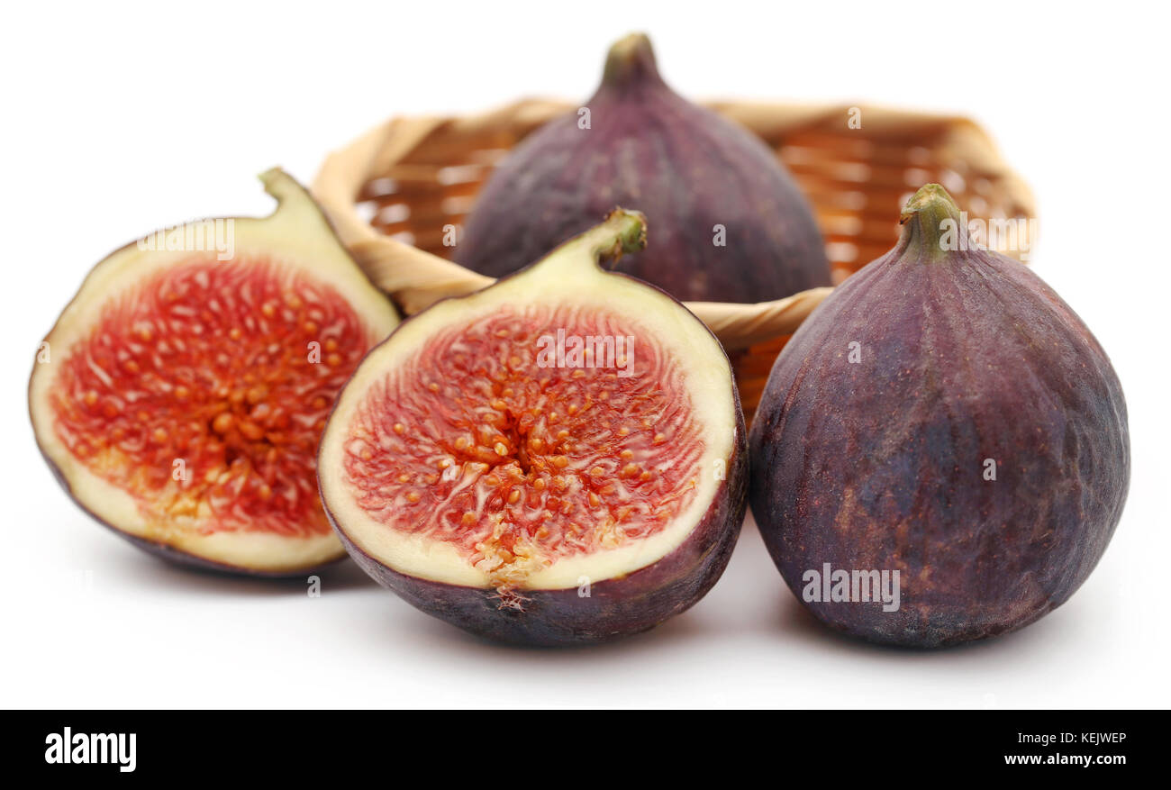 Fresh organic common fig whole and sliced on white Stock Photo - Alamy