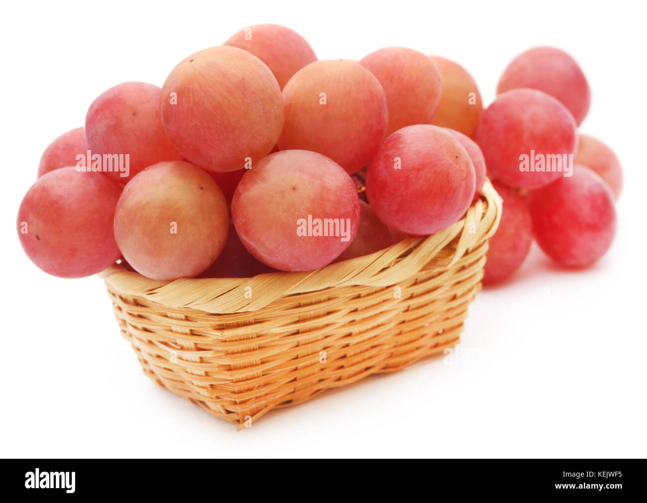 Organic red grapes over white background Stock Photo - Alamy