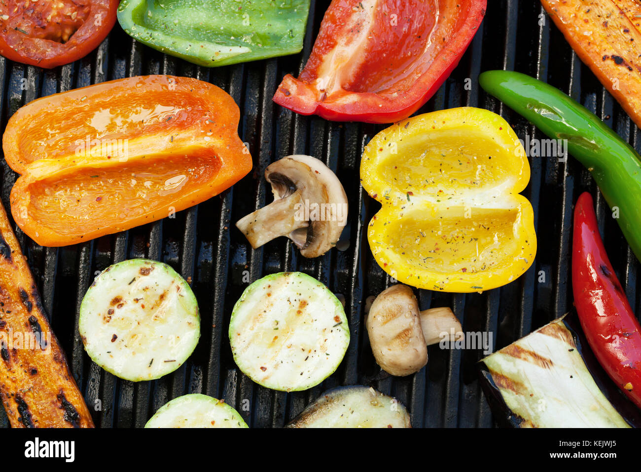 Grilled vegetables cooking. Top view Stock Photo - Alamy