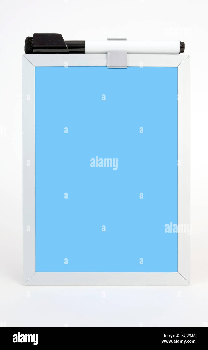 Blue dry erase board with pen on top of frame. Vertical Stock Photo - Alamy