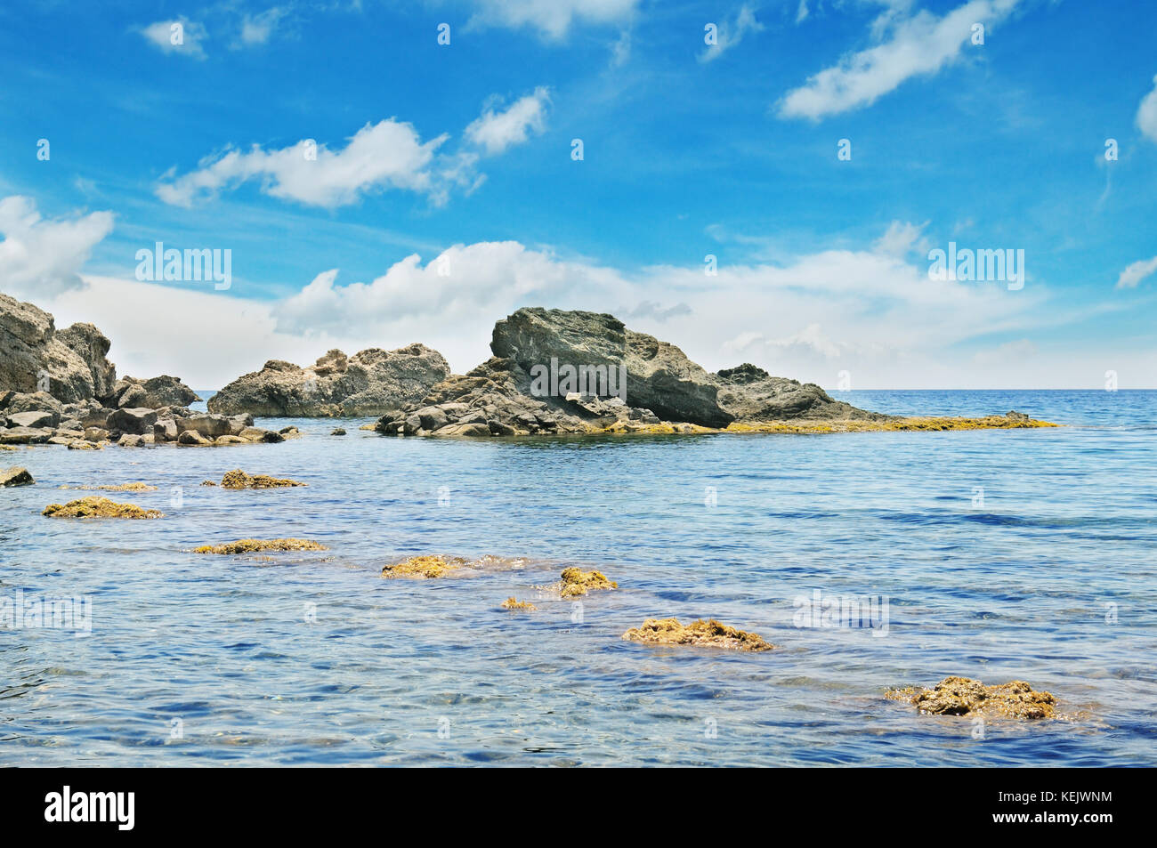 ocean, picturesque beach and blue sky Stock Photo - Alamy