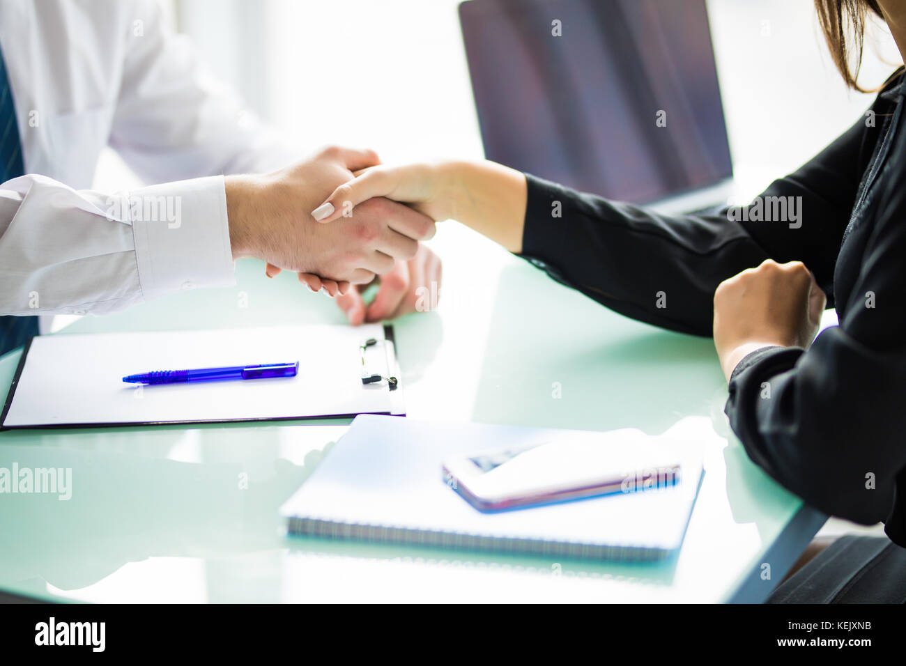 Business handshake at meeting or negotiation in the office. Partners ...