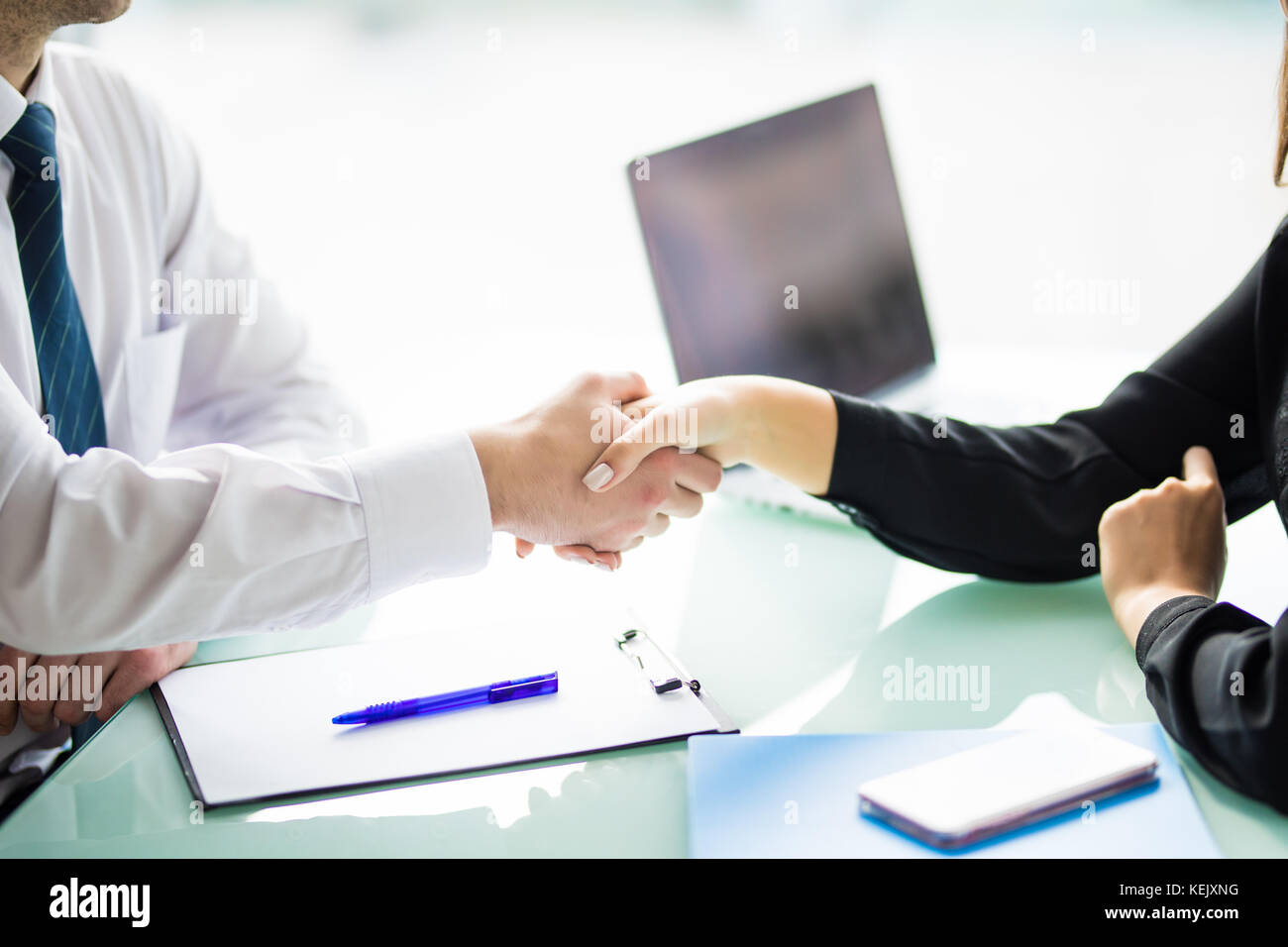 Business handshake at meeting or negotiation in the office. Partners ...