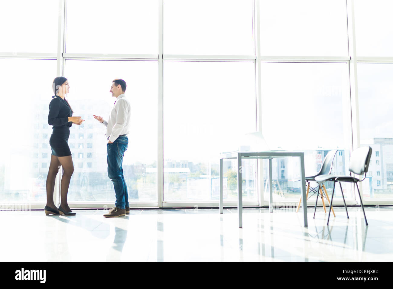 Couple of business man, woman talk about document Object tool in office ...