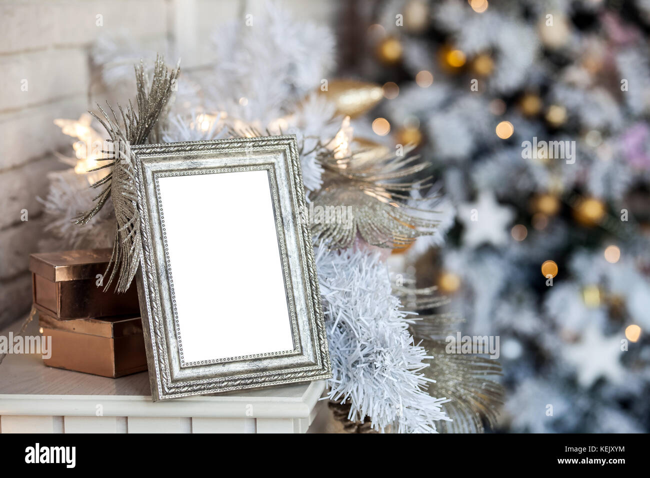 White photo frame with christmas background Stock Photo - Alamy