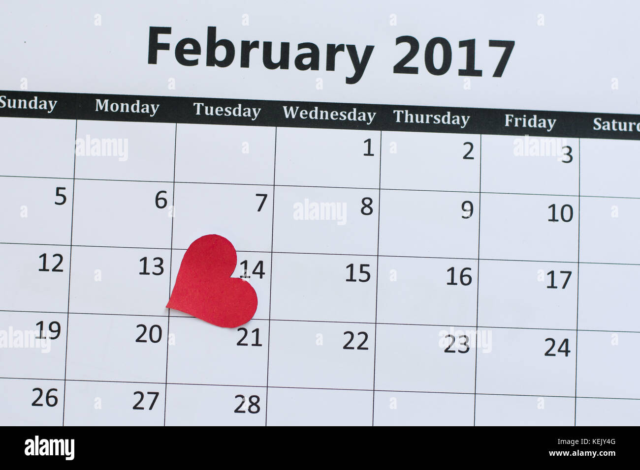 Calendar Valentines day and red hearts paper Stock Photo - Alamy