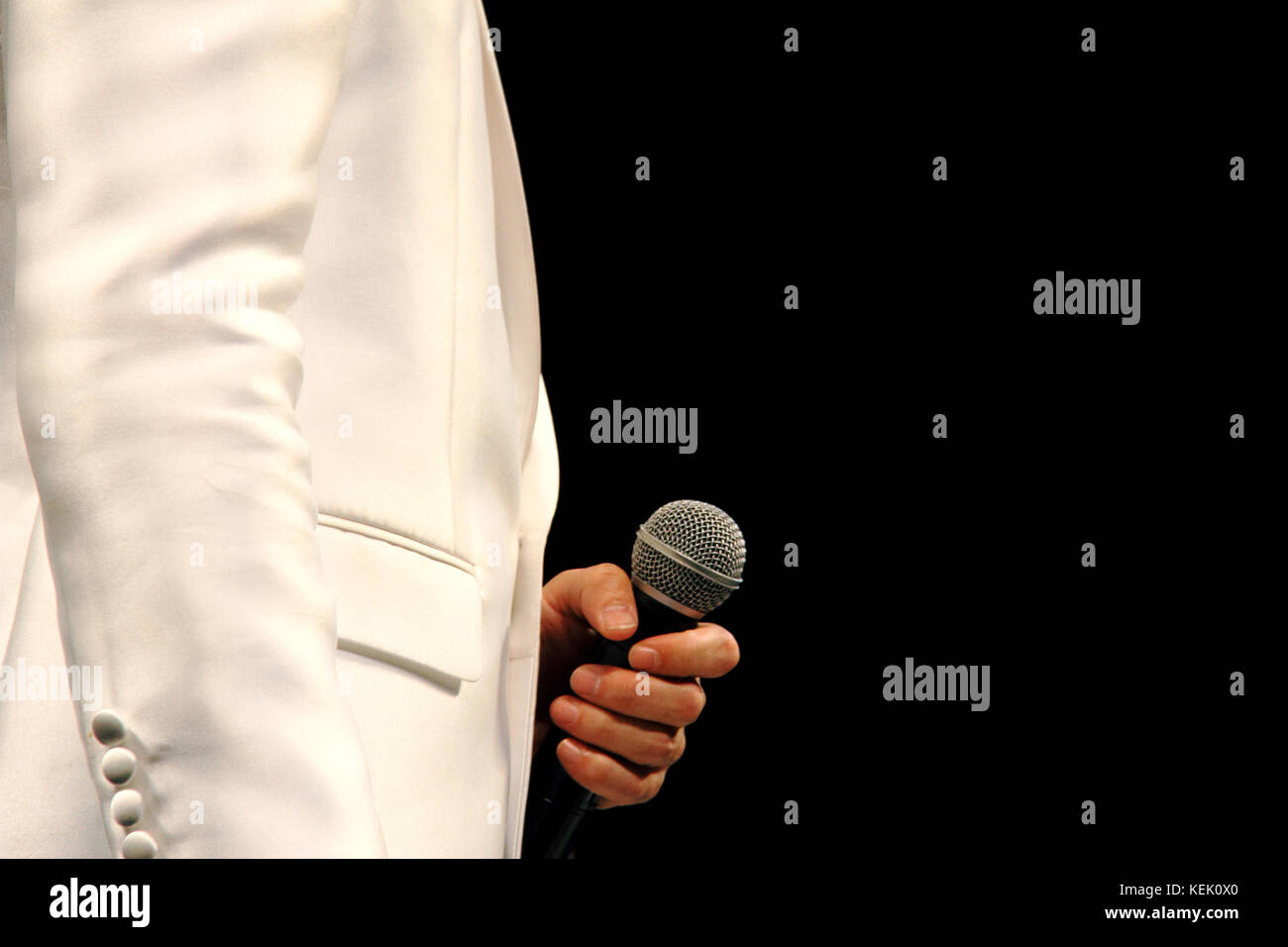 Man male holding microphone hi-res stock photography and images - Alamy