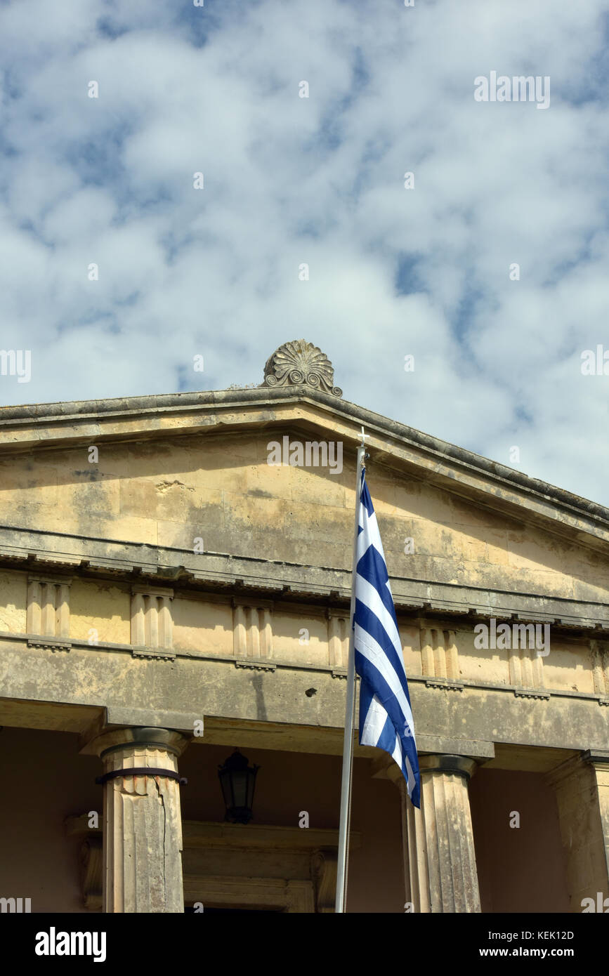 the national flag of Greece or greek emblems flying on a pole outside ...