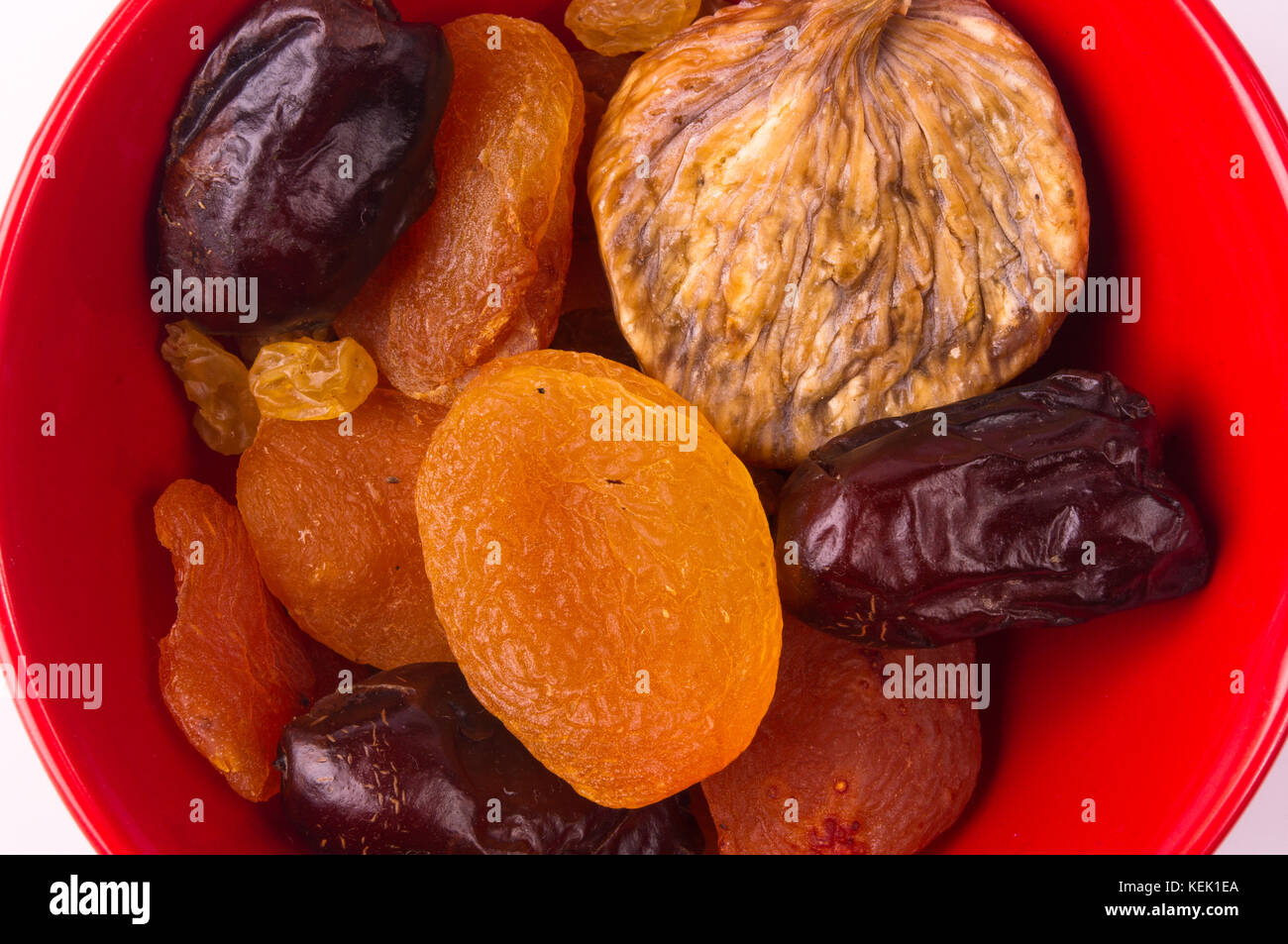 various dried fruits on the white background Stock Photo - Alamy