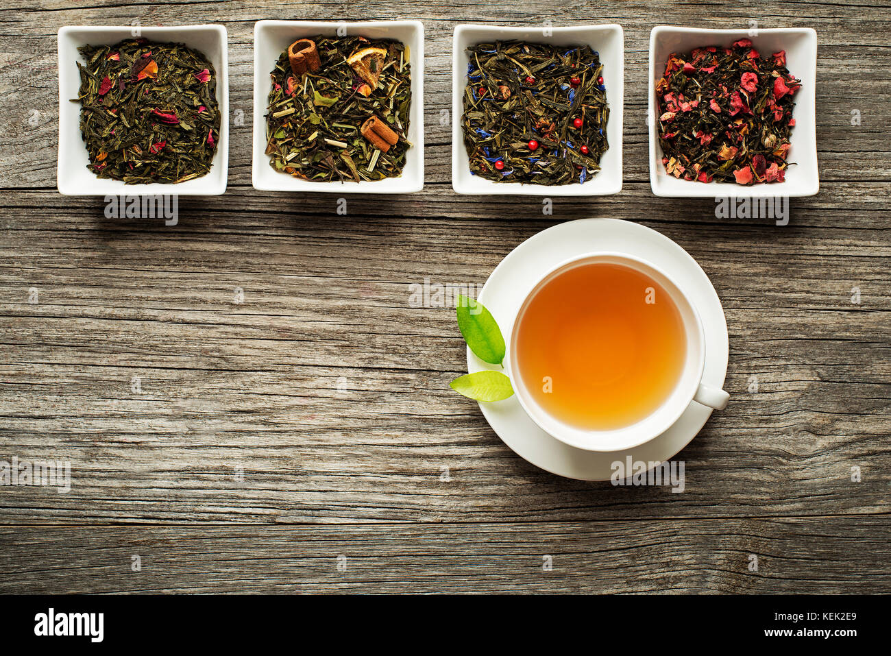 Cup of tea with dry tea collection of different types Stock Photo - Alamy