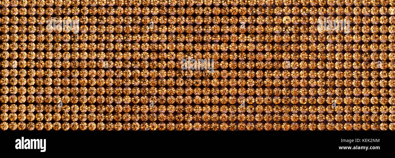 Canvas of gold rhinestones. Background Long Stock Photo - Alamy