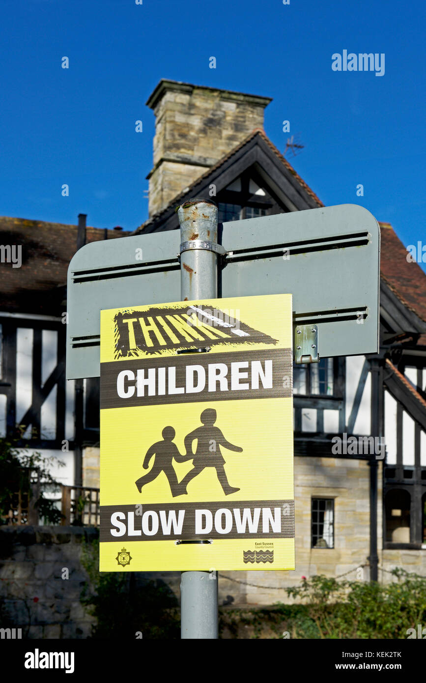 Road sign - children, slow down - in England UK Stock Photo - Alamy