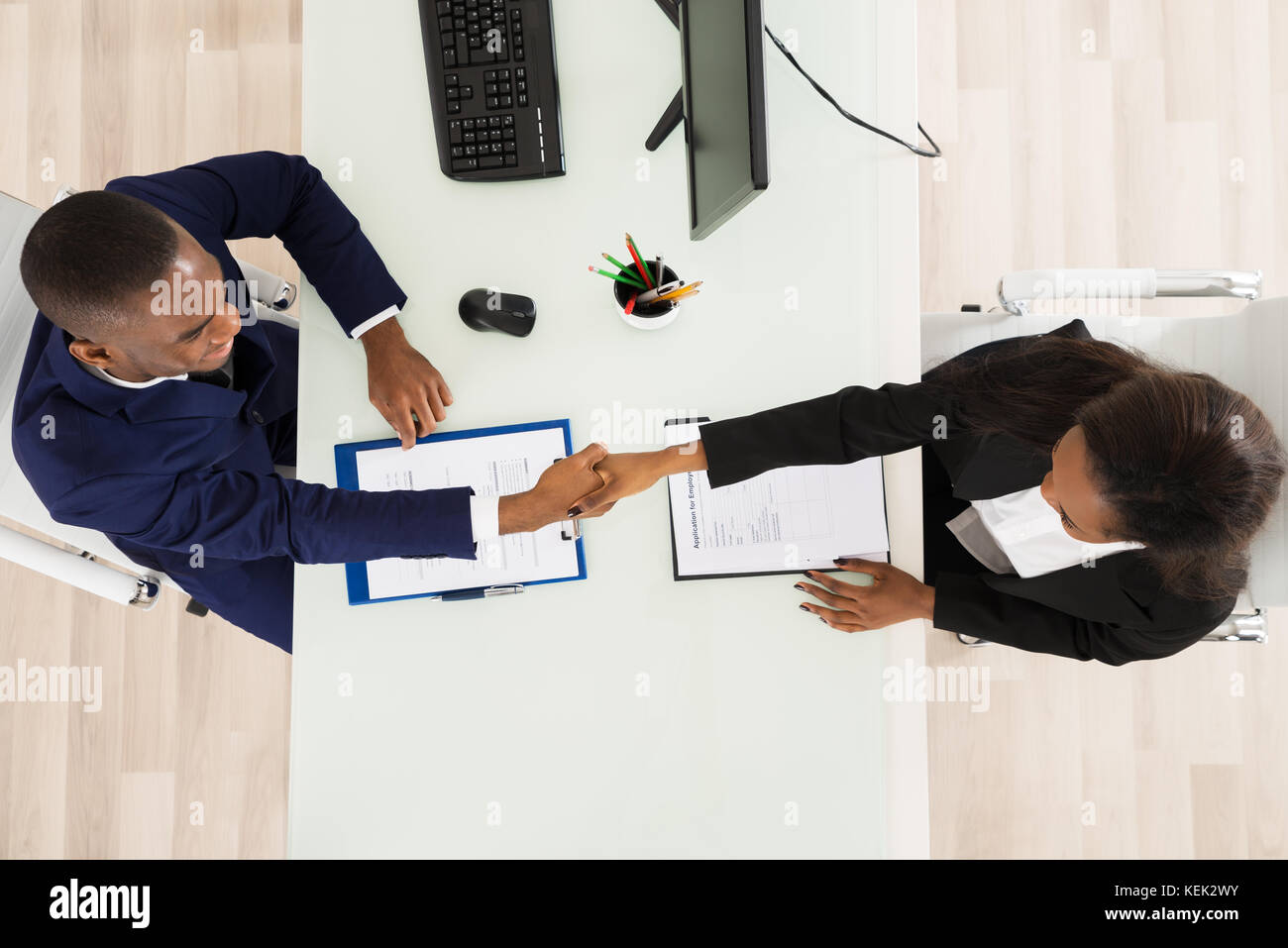 Top view manager shaking hand hi-res stock photography and images - Alamy