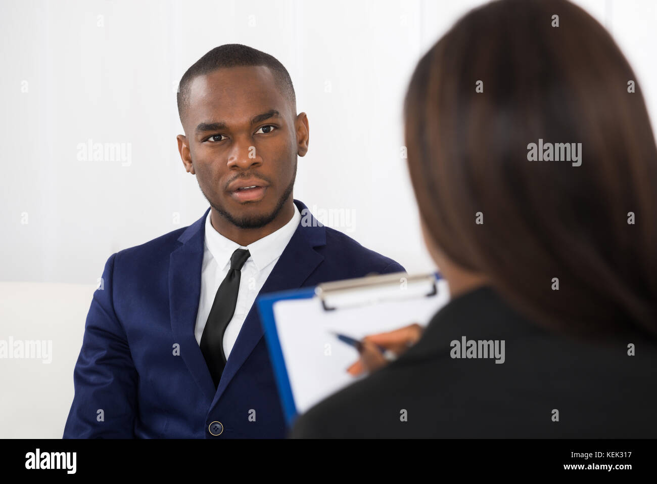 Young African American Man Explaining His Problems To The Psychologist ...