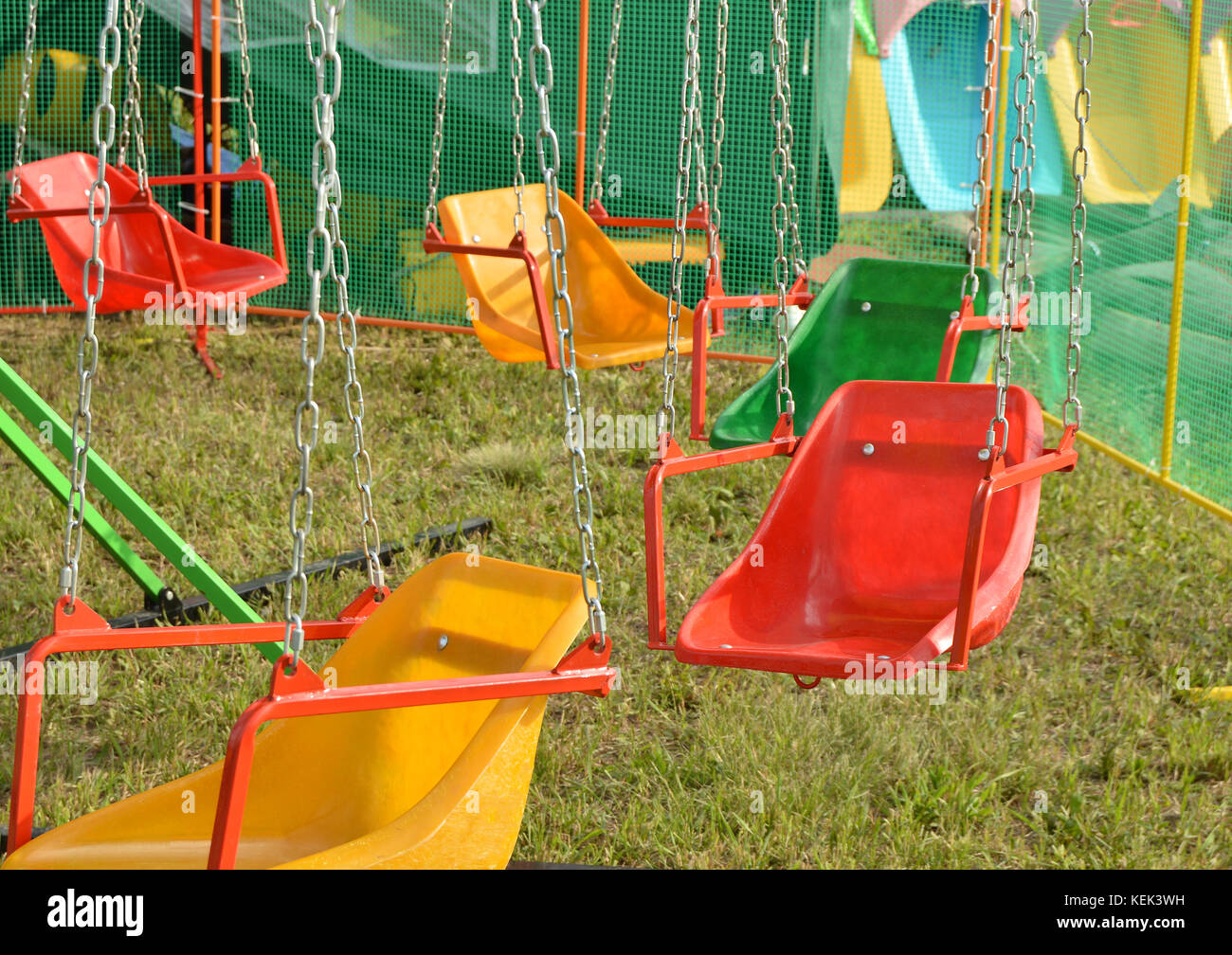 Exciting rides for children - swings, roundabout on the chains Stock ...