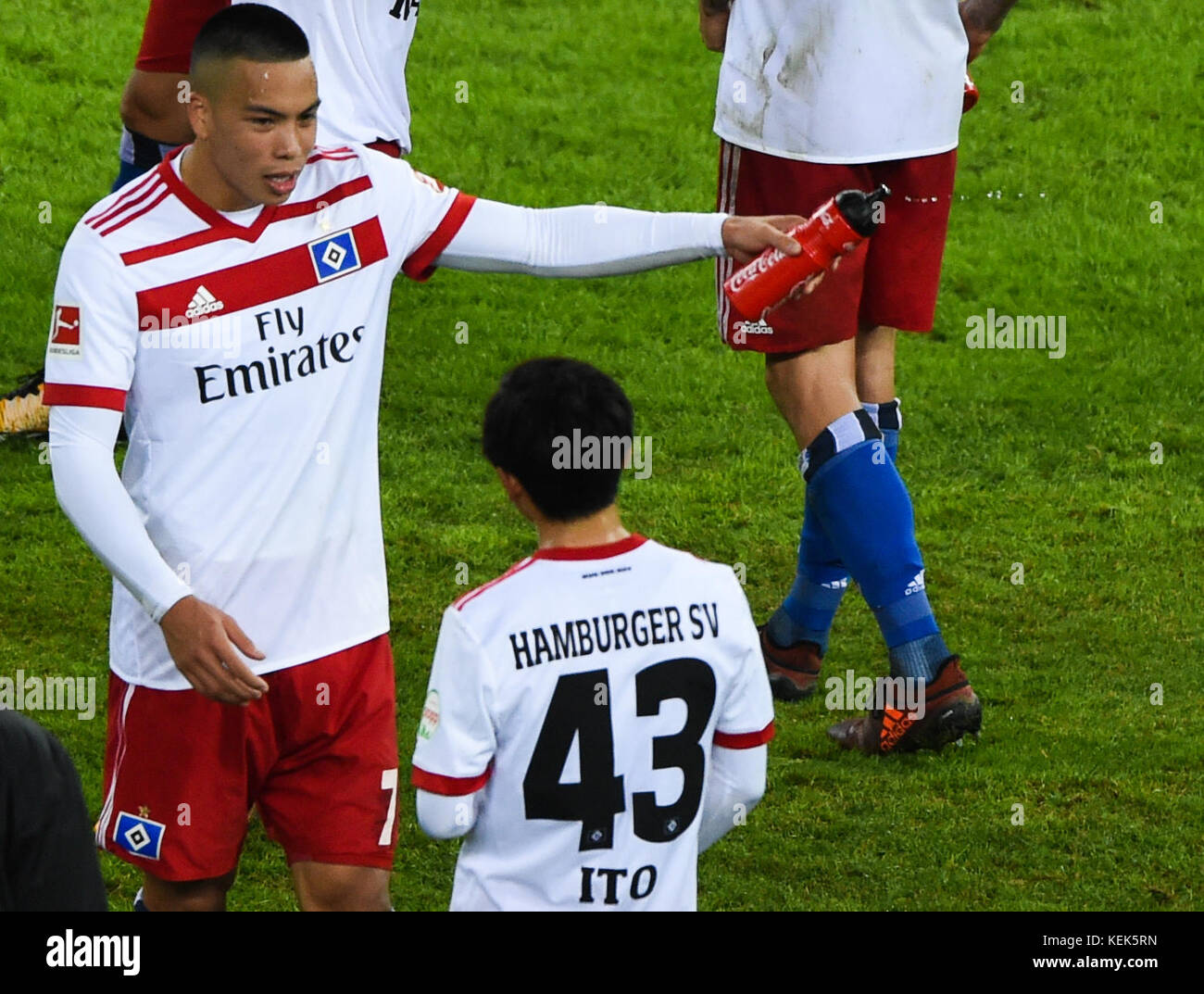 Hamburg's Bobby Wood (L) speaks to Hamburg's Tatsuya Ito after the ...