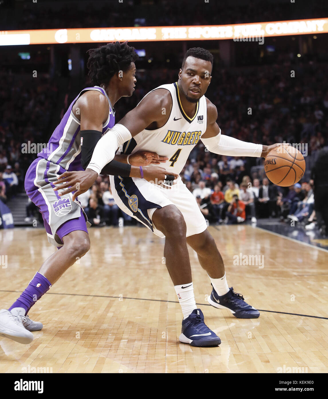 Denver, Colorado, USA. 21st Oct, 2017. Nuggets PAUL MILSAP, right, goes ...