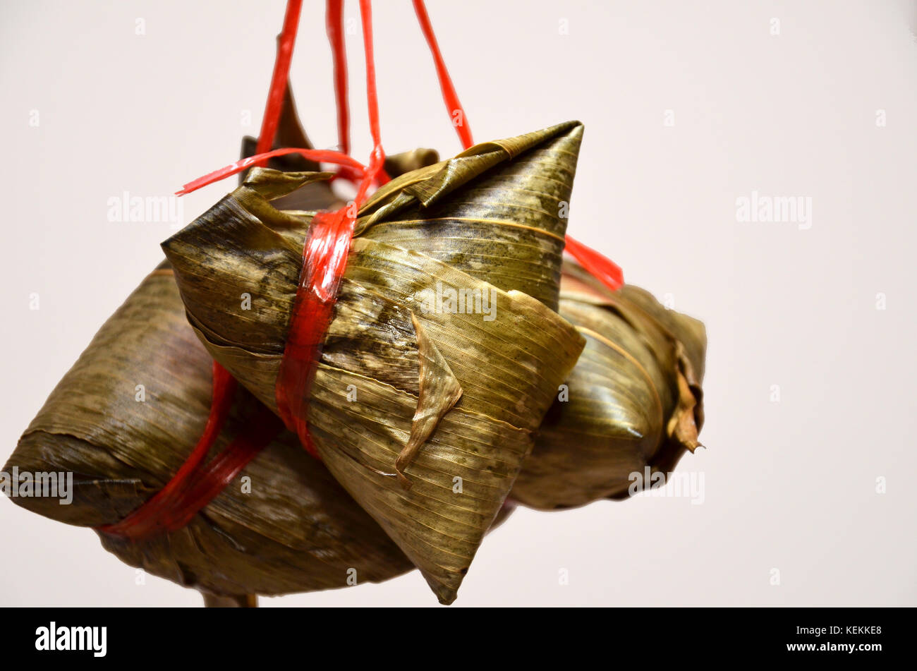 Traditional homemade chinese rice dumplings isolated on white color ...