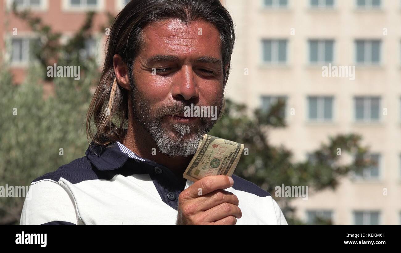 Caucasian Male Holding Money Stock Photo - Alamy