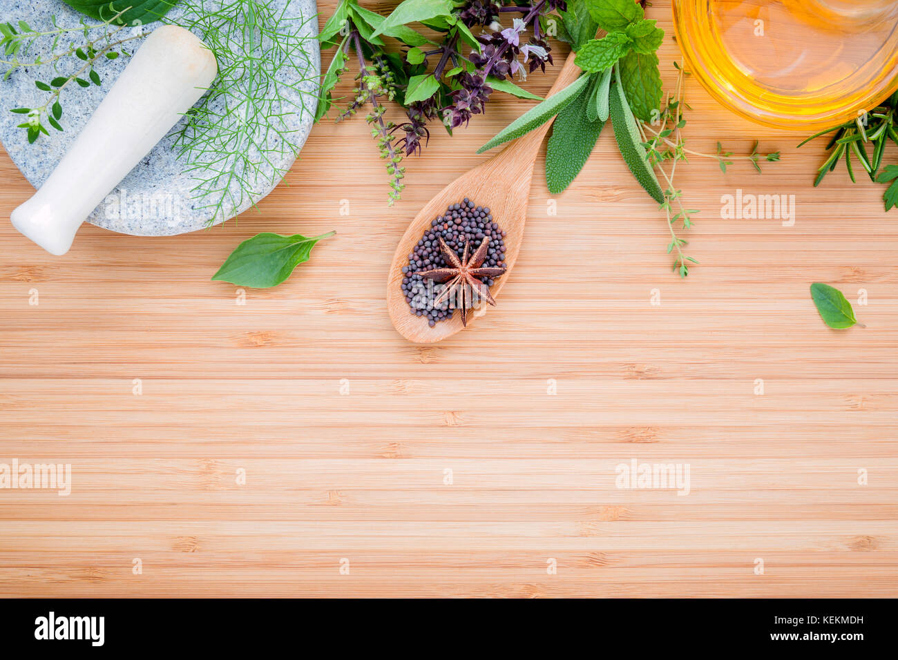 Assortment of herbs rosemary ,thyme,sage, mint and parsley set up with ...