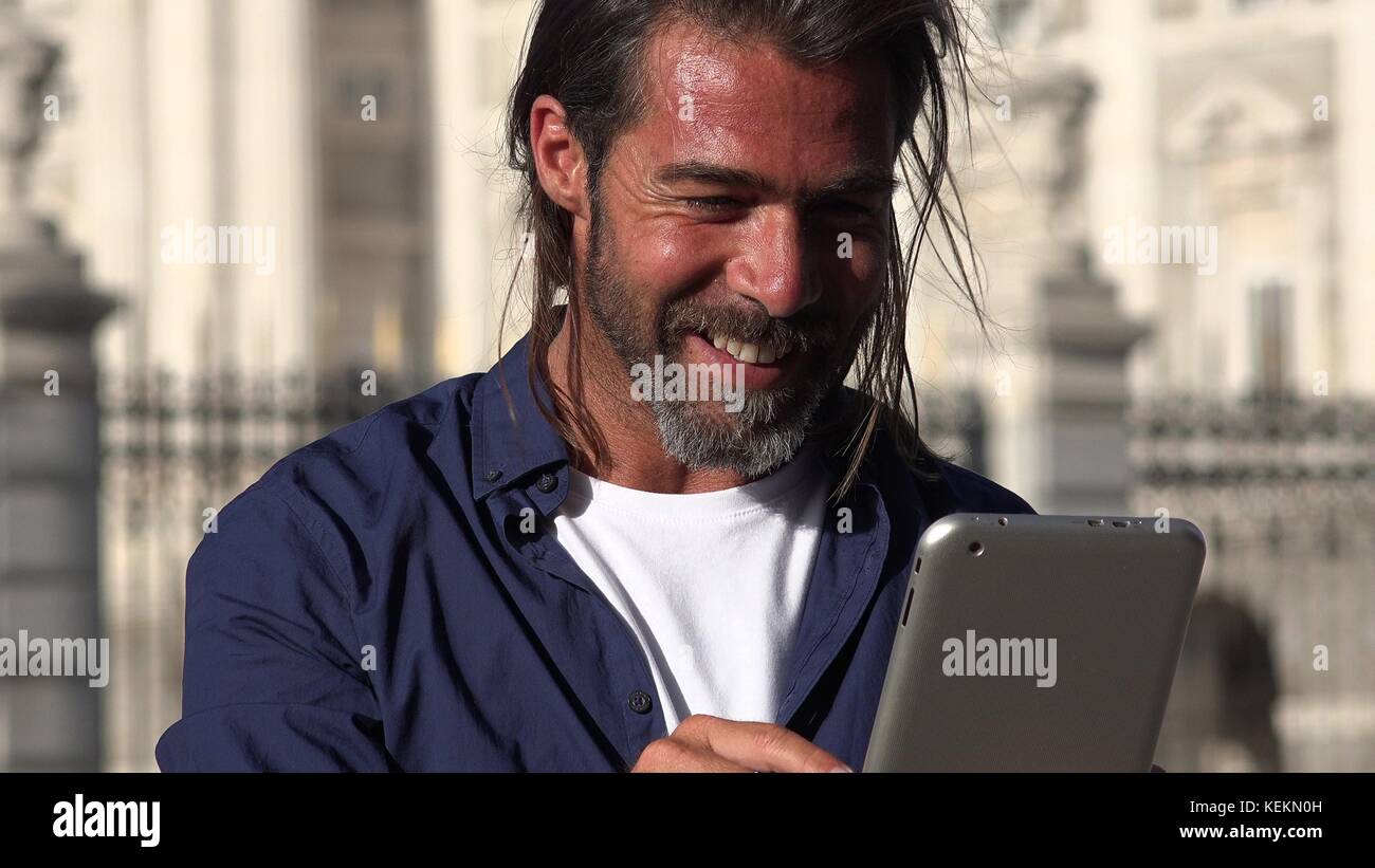 Male Using Tablet Stock Photo - Alamy