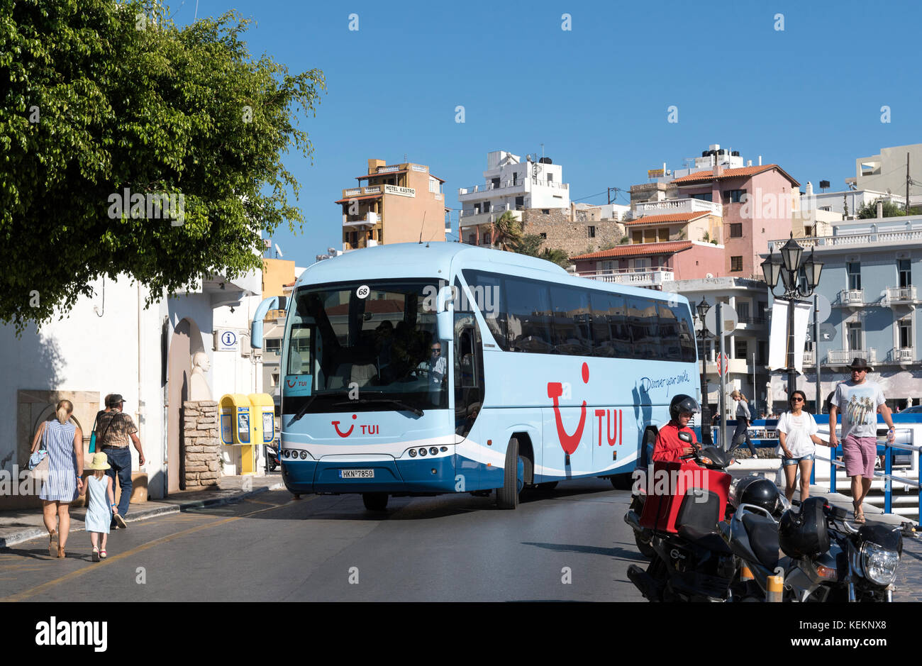 Agios Nikolaos Crete, Greece. A TUI coach passing through the old town ...
