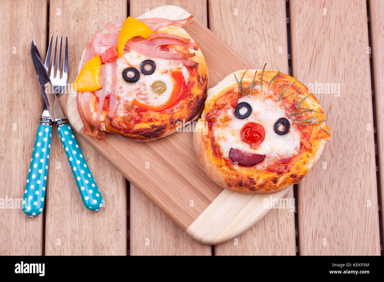 face shape pizza Stock Photo - Alamy