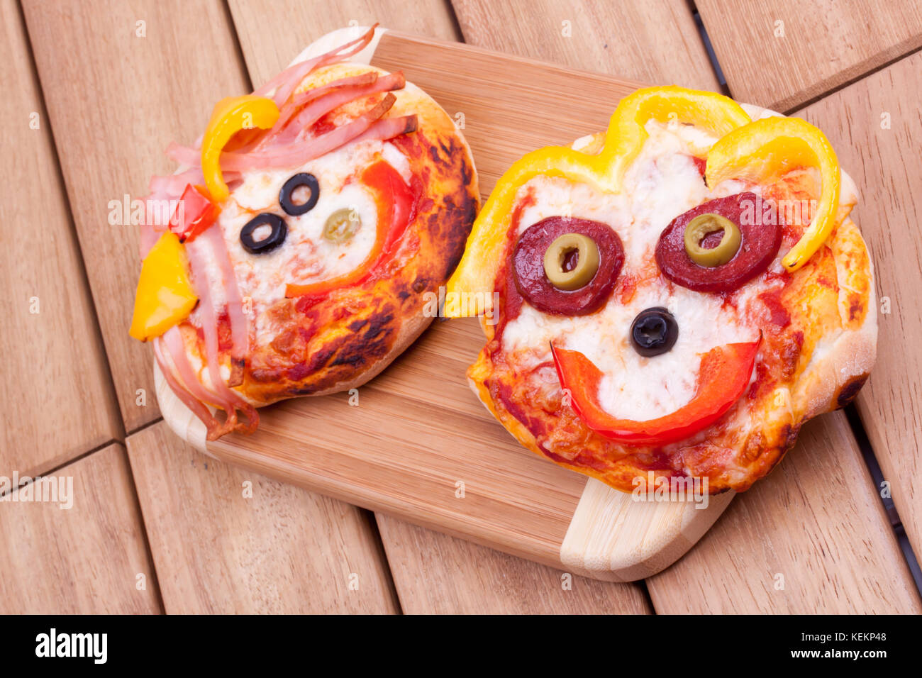 face shape pizza Stock Photo - Alamy